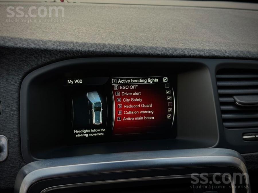 Blue Volvo V60 2014 in Riga, with an engine capacity of 2.00 L and mileage of 274 thousand km for 8150 €, photo 22 on AUTOMOTO.COM.LV