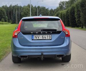 Blue Volvo V60 2014 in Riga, with an engine capacity of 2.00 L and mileage of 273 thousand km for 6200 €, photo 3 on AUTOMOTO.COM.LV