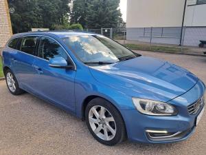 Blue Volvo V60 2014 in Kaunas, with an engine capacity of 1.56 L and mileage of 223 thousand km for 6550 €, photo  on AUTOMOTO.COM.LV