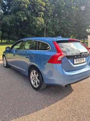 Blue Volvo V60 2014 in Kaunas, with an engine capacity of 1.56 L and mileage of 223 thousand km for 6550 €, photo 17 on AUTOMOTO.COM.LV