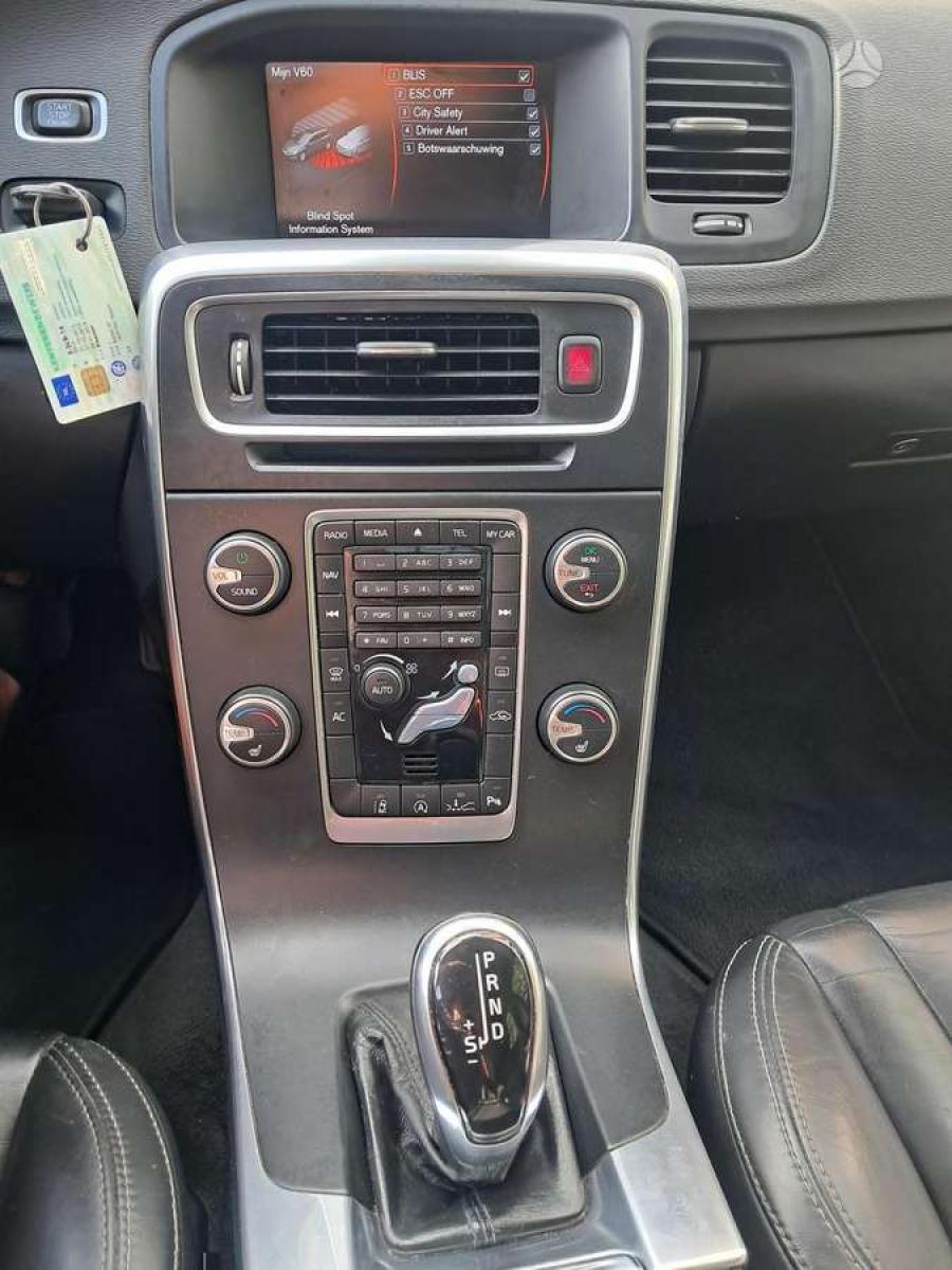 Blue Volvo V60 2014 in Kaunas, with an engine capacity of 1.56 L and mileage of 223 thousand km for 6550 €, photo 31 on AUTOMOTO.COM.LV