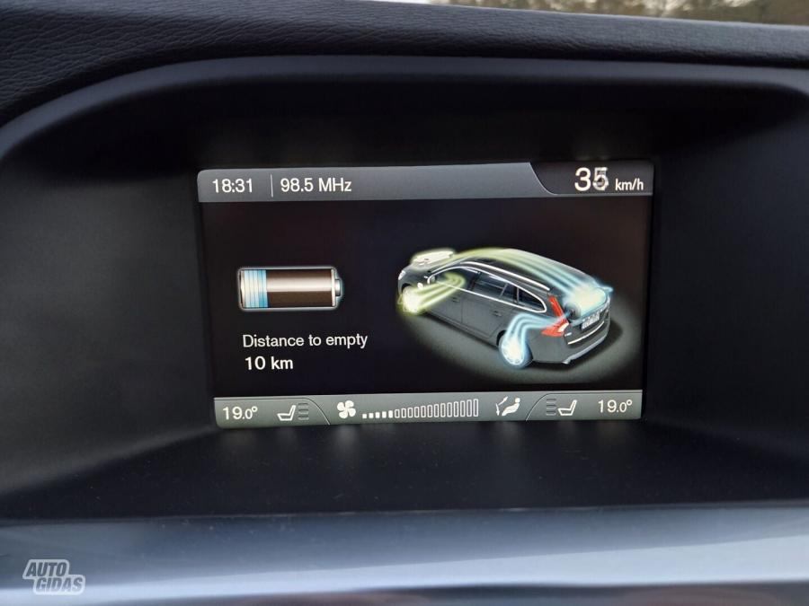 Blue Volvo V60 2014 in Kaunas, with an engine capacity of 2.40 L and mileage of 206 thousand km for 7650 €, photo 20 on AUTOMOTO.COM.LV