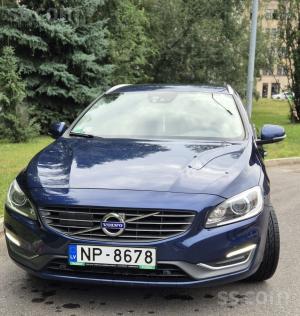 Blue Volvo V60 2015 in Riga, with an engine capacity of 2.00 L and mileage of 244 thousand km for 10460 €, photo 1 on AUTOMOTO.COM.LV