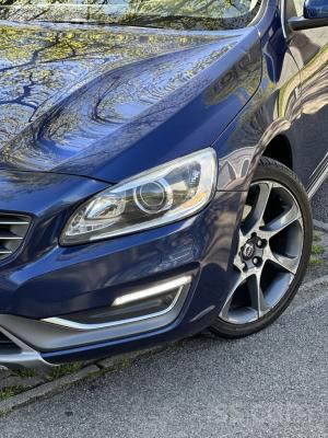 Blue Volvo V60 2015 in Riga, with an engine capacity of 2.00 L and mileage of 0 thousand km for 6790 €, photo 10 on AUTOMOTO.COM.LV
