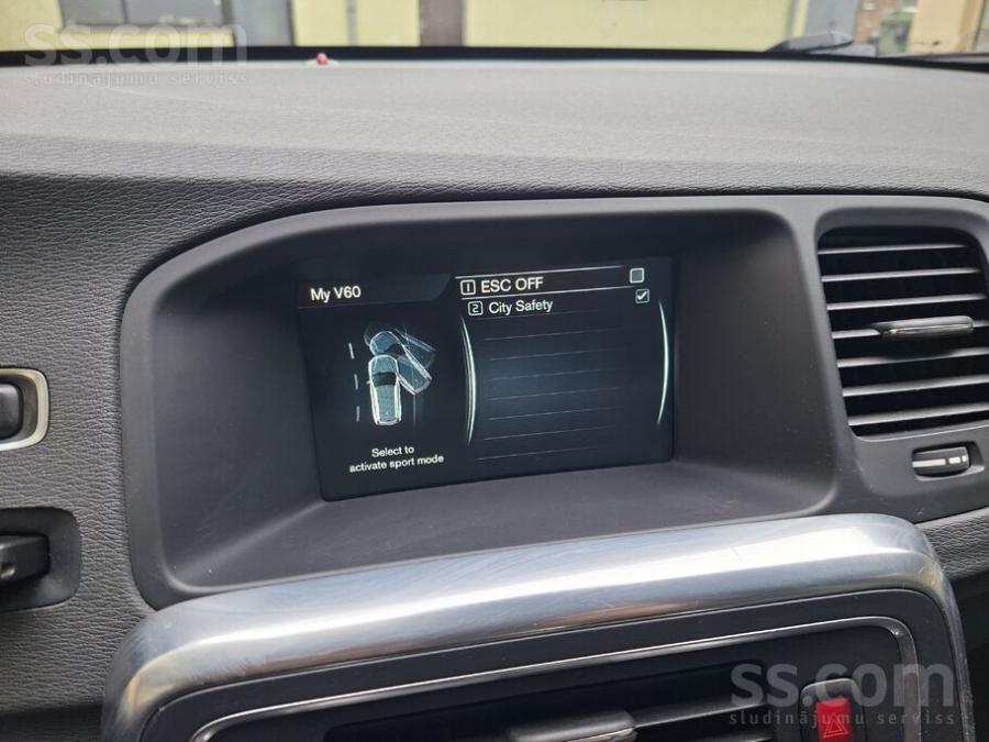 Blue Volvo V60 2015 in Riga, with an engine capacity of 2.00 L and mileage of 246 thousand km for 6300 €, photo 14 on AUTOMOTO.COM.LV