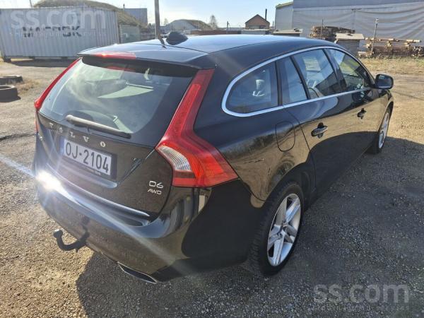 Brūns Volvo V60 2013 Rīga, ar dzinēja tilpumu 2.40 L un nobraukumu 284 tūkst. km par 6995 €, foto 6 vietnē AUTOMOTO.COM.LV