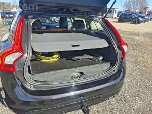 Brūns Volvo V60 2013 Rīga, ar dzinēja tilpumu 2.40 L un nobraukumu 284 tūkst. km par 6995 €, foto 13 vietnē AUTOMOTO.COM.LV