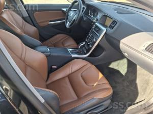 Brūns Volvo V60 2013 Rīga, ar dzinēja tilpumu 2.40 L un nobraukumu 284 tūkst. km par 6995 €, foto 16 vietnē AUTOMOTO.COM.LV