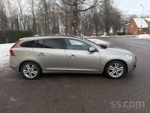 Brown Volvo V60 2011 in Riga, with an engine capacity of 1.60 L and mileage of 291 thousand km for 3950 €, photo 6 on AUTOMOTO.COM.LV