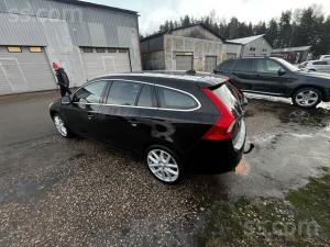 Brown Volvo V60 2012 in Riga, with an engine capacity of 2.40 L and mileage of 369 thousand km for 6800 €, photo  on AUTOMOTO.COM.LV