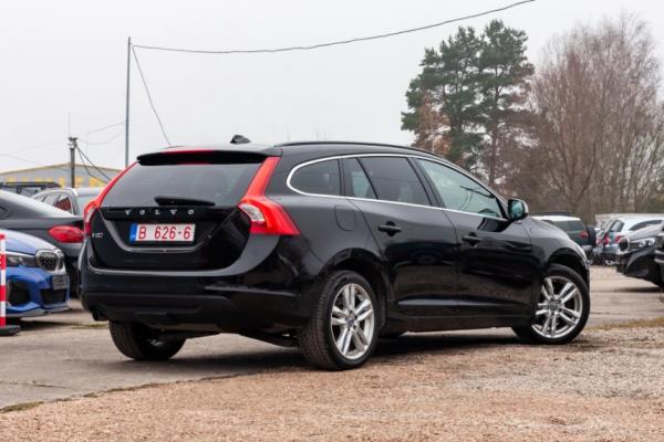 Brown Volvo V60 2012 in Riga, with an engine capacity of 1.60 L and mileage of 245 thousand km for 6495 €, photo 6 on AUTOMOTO.COM.LV