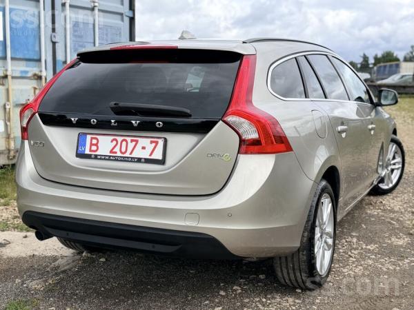 Brown Volvo V60 2012 in Riga, with an engine capacity of 1.60 L and mileage of 158 thousand km for 6995 €, photo 4 on AUTOMOTO.COM.LV