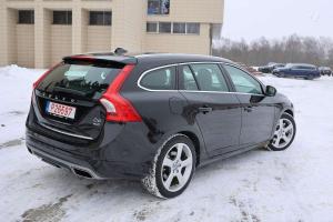 Brown Volvo V60 2013 in Alytus, with an engine capacity of 2.40 L and mileage of 273 thousand km for 7700 €, photo 4 on AUTOMOTO.COM.LV