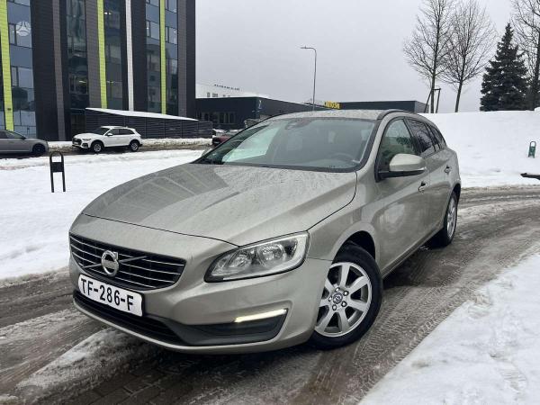 Brown Volvo V60 2013 in Vilnius, with an engine capacity of 1.56 L and mileage of 223 thousand km for 7200 €, photo 1 on AUTOMOTO.COM.LV