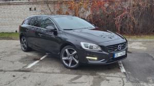 Brown Volvo V60 2013 in Riga, with an engine capacity of 2.40 L and mileage of 270 thousand km for 8990 €, photo  on AUTOMOTO.COM.LV