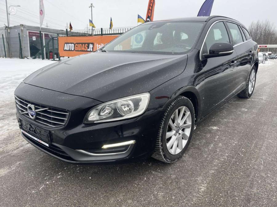 Brown Volvo V60 2014 in Kaunas, with an engine capacity of 1.97 L and mileage of 270 thousand km for 5950 €, photo 5 on AUTOMOTO.COM.LV