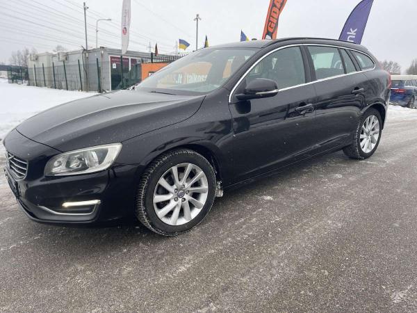 Brown Volvo V60 2014 in Kaunas, with an engine capacity of 1.97 L and mileage of 270 thousand km for 5950 €, photo 6 on AUTOMOTO.COM.LV
