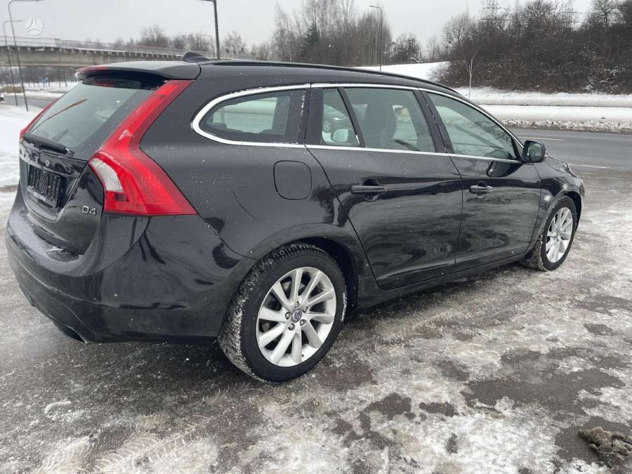 Brown Volvo V60 2014 in Kaunas, with an engine capacity of 1.97 L and mileage of 270 thousand km for 5950 €, photo 14 on AUTOMOTO.COM.LV