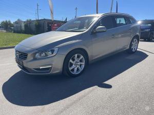 Brown Volvo V60 2014 in Kaunas, with an engine capacity of 1.98 L and mileage of 272 thousand km for 7150 €, photo 7 on AUTOMOTO.COM.LV