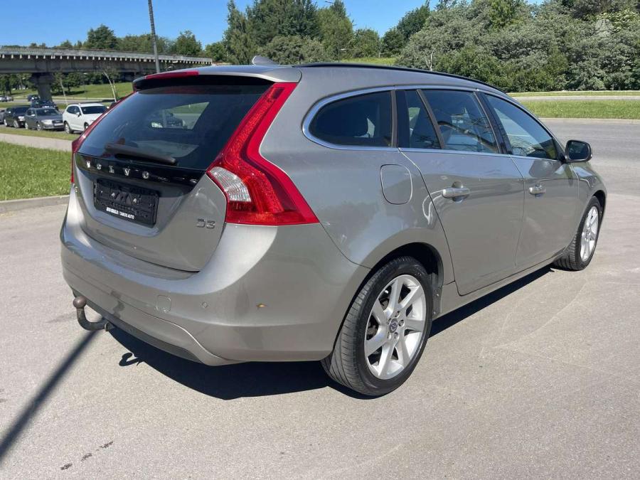 Brown Volvo V60 2014 in Kaunas, with an engine capacity of 1.98 L and mileage of 272 thousand km for 7150 €, photo 14 on AUTOMOTO.COM.LV