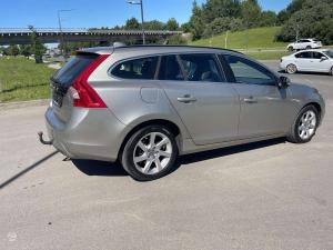 Brown Volvo V60 2014 in Kaunas, with an engine capacity of 1.98 L and mileage of 272 thousand km for 7150 €, photo 15 on AUTOMOTO.COM.LV