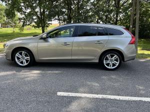 Brown Volvo V60 2014 in Prienai, with an engine capacity of 2.00 L and mileage of 289 thousand km for 6250 €, photo 6 on AUTOMOTO.COM.LV
