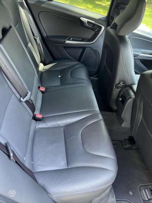 Brown Volvo V60 2014 in Prienai, with an engine capacity of 2.00 L and mileage of 289 thousand km for 6250 €, photo 18 on AUTOMOTO.COM.LV