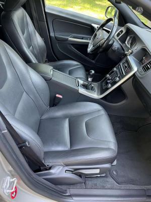 Brown Volvo V60 2014 in Prienai, with an engine capacity of 2.00 L and mileage of 289 thousand km for 6250 €, photo 19 on AUTOMOTO.COM.LV