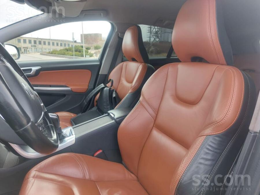 Brown Volvo V60 2014 in Ventspils, with an engine capacity of 2.00 L and mileage of 0 thousand km for 6599 €, photo 6 on AUTOMOTO.COM.LV