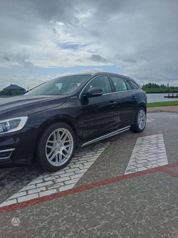 Brown Volvo V60 2014 in Kaunas, with an engine capacity of 2.40 L and mileage of 254 thousand km for 7000 €, photo 6 on AUTOMOTO.COM.LV