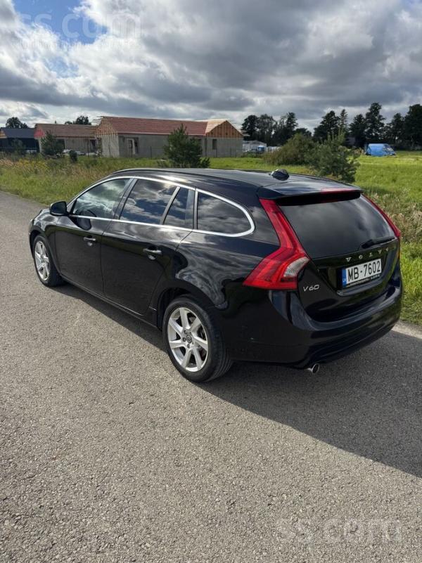 Brown Volvo V60 2014 in Riga, with an engine capacity of 2.00 L and mileage of 300 thousand km for 5750 €, photo 5 on AUTOMOTO.COM.LV