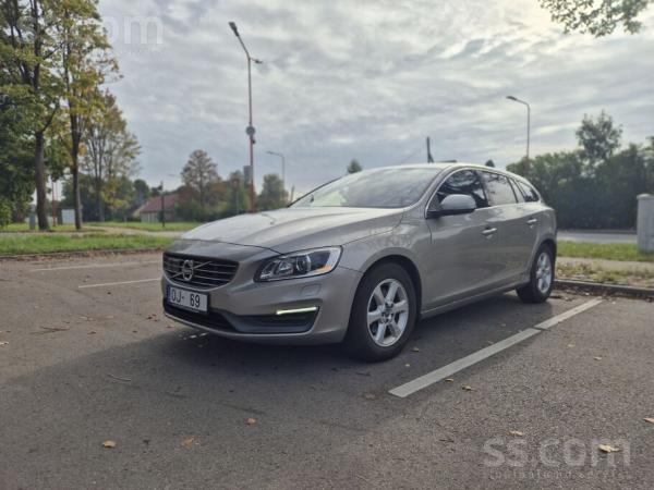 Brown Volvo V60 2014 in Jekabpils, with an engine capacity of 1.60 L and mileage of 301 thousand km for 6390 €, photo 1 on AUTOMOTO.COM.LV
