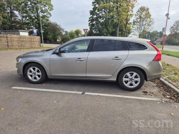 Brown Volvo V60 2014 in Jekabpils, with an engine capacity of 1.60 L and mileage of 301 thousand km for 6390 €, photo 6 on AUTOMOTO.COM.LV