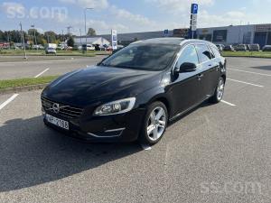 Brūns Volvo V60 2014 Rīga, ar dzinēja tilpumu 2.40 L un nobraukumu 213 tūkst. km par 9450 €, foto  vietnē AUTOMOTO.COM.LV