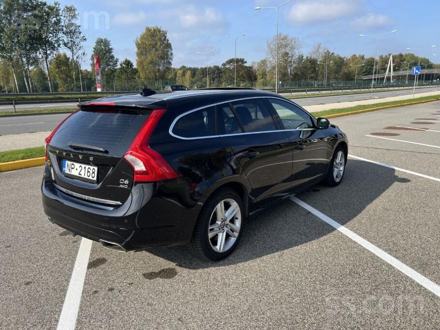 Brūns Volvo V60 2014 Rīga, ar dzinēja tilpumu 2.40 L un nobraukumu 213 tūkst. km par 9450 €, foto 5 vietnē AUTOMOTO.COM.LV
