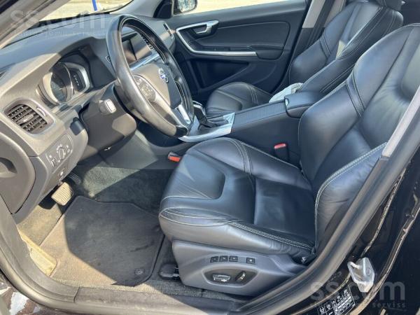 Brown Volvo V60 2014 in Riga, with an engine capacity of 2.40 L and mileage of 213 thousand km for 9450 €, photo 8 on AUTOMOTO.COM.LV