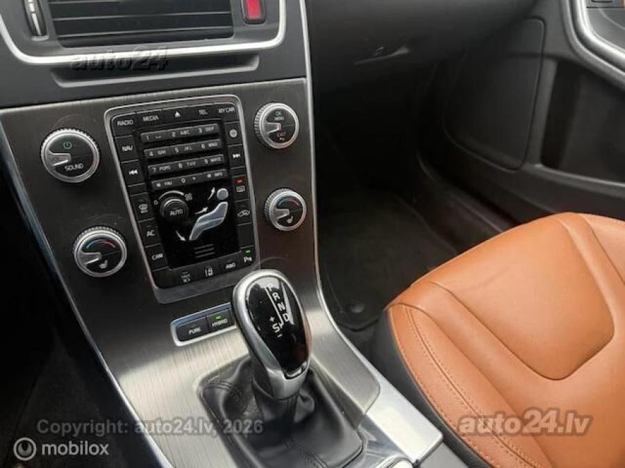 Brown Volvo V60 2015 in Tartu, with an engine capacity of 2.40 L and mileage of 192 thousand km for 12100 €, photo 8 on AUTOMOTO.COM.LV