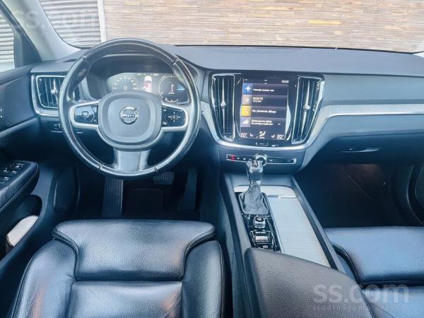 Brown Volvo V60 2018 in Riga, with an engine capacity of 2.00 L and mileage of 262 thousand km for 15290 €, photo 6 on AUTOMOTO.COM.LV