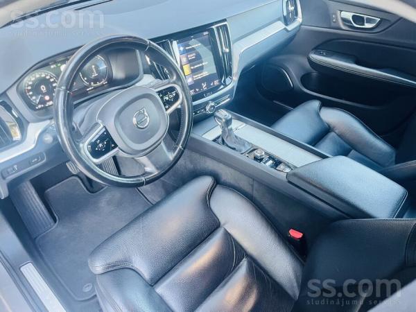 Brown Volvo V60 2018 in Riga, with an engine capacity of 2.00 L and mileage of 262 thousand km for 15290 €, photo 8 on AUTOMOTO.COM.LV