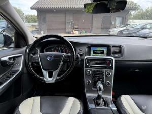 Brown Volvo V60 Cross Country 2015 in Kaunas, with an engine capacity of 2.00 L and mileage of 289 thousand km for 9250 €, photo 19 on AUTOMOTO.COM.LV