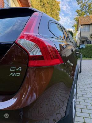 Brown Volvo V60 Cross Country 2016 in Birstonas, with an engine capacity of 2.40 L and mileage of 314 thousand km for 8500 €, photo 6 on AUTOMOTO.COM.LV