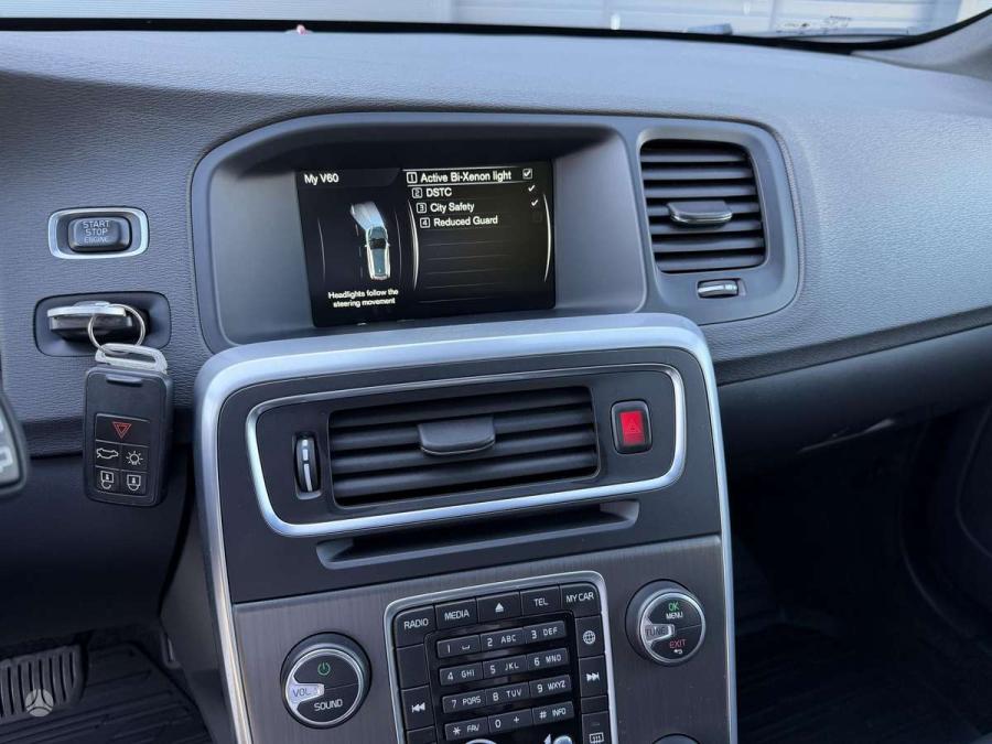 Grey Volvo V60 Cross Country 2014 in Utena, with an engine capacity of 2.40 L and mileage of 232 thousand km for 10850 €, photo 13 on AUTOMOTO.COM.LV