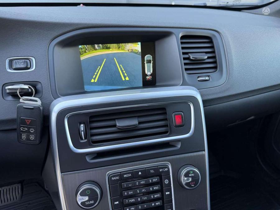 Grey Volvo V60 Cross Country 2014 in Utena, with an engine capacity of 2.40 L and mileage of 232 thousand km for 10850 €, photo 14 on AUTOMOTO.COM.LV