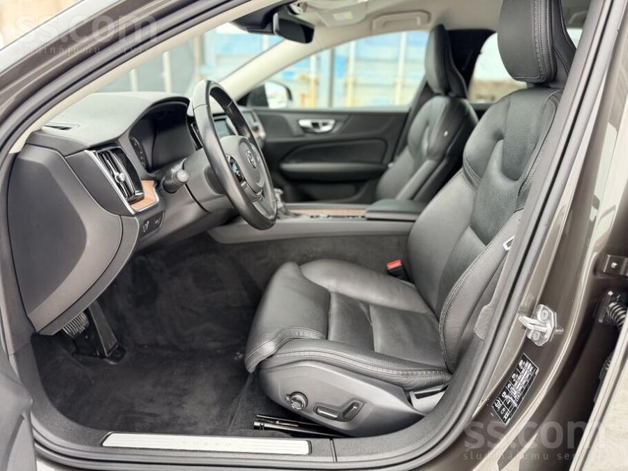 Green Volvo V60 2019 in Riga, with an engine capacity of 2.00 L and mileage of 208 thousand km for 18995 €, photo 13 on AUTOMOTO.COM.LV