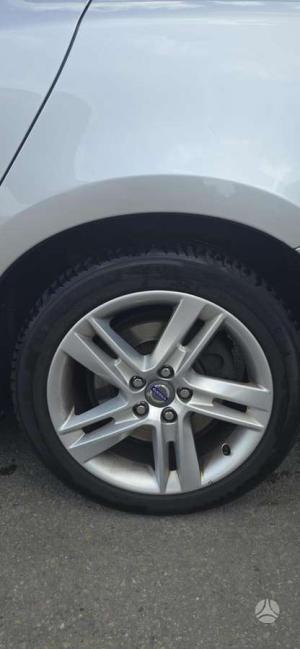 Grey Volvo V60 2013 in Vilnius, with an engine capacity of 2.40 L and mileage of 286 thousand km for 6999 €, photo 26 on AUTOMOTO.COM.LV