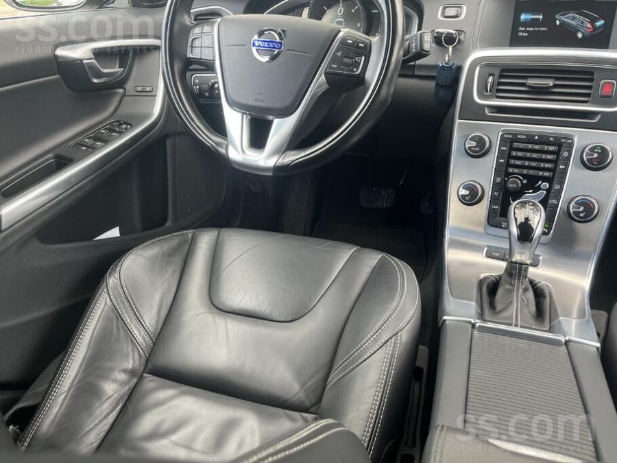 Grey Volvo V60 2014 in Ludza, with an engine capacity of 2.40 L and mileage of 330 thousand km for 8200 €, photo 21 on AUTOMOTO.COM.LV