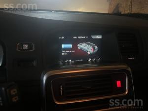 Grey Volvo V60 2014 in Ludza, with an engine capacity of 2.40 L and mileage of 330 thousand km for 8200 €, photo 32 on AUTOMOTO.COM.LV