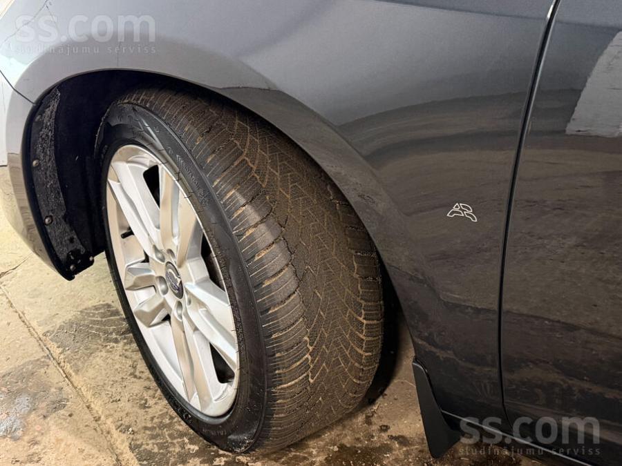 Pelēks Volvo V60 2012 Jūrmala, ar dzinēja tilpumu 2.00 L un nobraukumu 332 tūkst. km par 6495 €, foto 34 vietnē AUTOMOTO.COM.LV