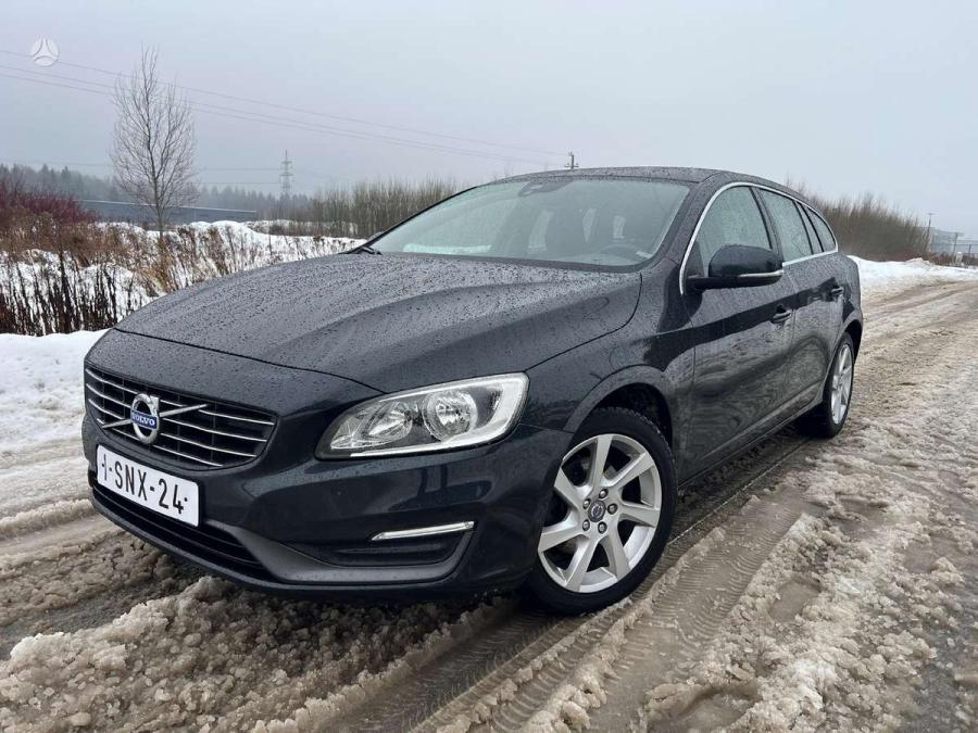 Grey Volvo V60 2013 in Kaunas, with an engine capacity of 1.56 L and mileage of 237 thousand km for 6450 €, photo 1 on AUTOMOTO.COM.LV