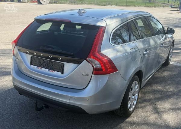 Grey Volvo V60 2013 in Marijampole, with an engine capacity of 1.60 L and mileage of 258 thousand km for 5499 €, photo 3 on AUTOMOTO.COM.LV